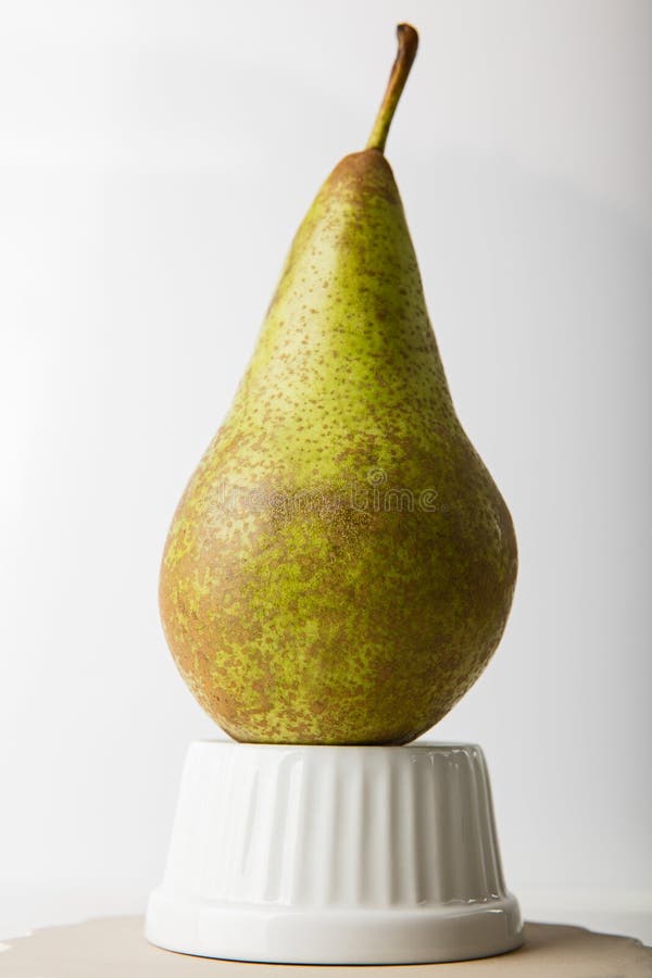 Ripe Pear on the Porcelain Form Stock Image - Image of plant, single ...