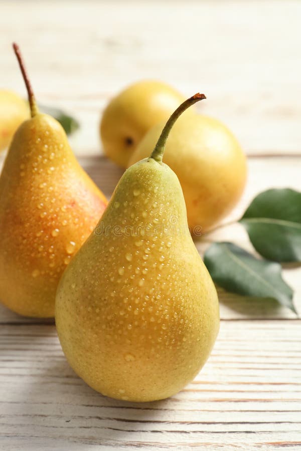 Ripe pears on wooden tabl stock image. Image of pear - 128541219