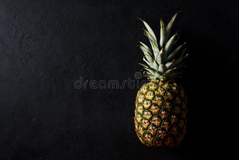 Ripe Pineapple on a Black Background Stock Image - Image of juice ...
