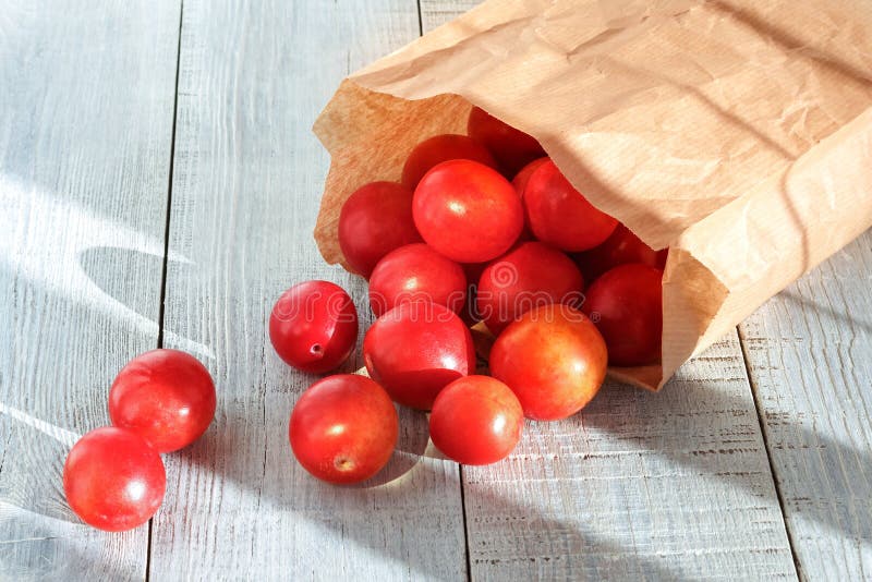 Ripe plums in a package stock photo. Image of tree, paper - 99136586