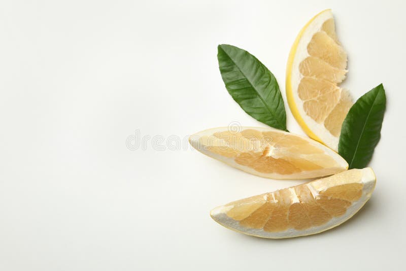 Ripe Pomelo Fruit Slices with Leaves on White Background Stock Image ...