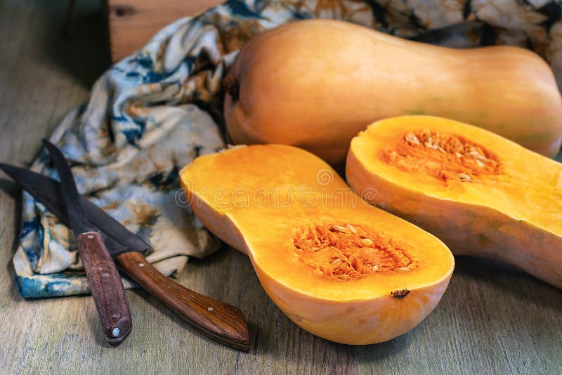 Pumpkin cut in half. stock photo. Image of ripe, diet - 127823022