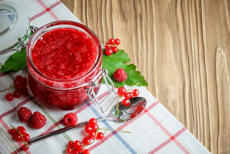 Ripe Raspberry and Raspberry Jam on a Wooden Table. Stock Photo - Image ...