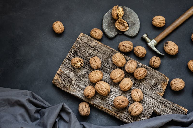 Ripe and Raw Whole Big Walnut Kernel with Shell on Rustic Backdrop ...