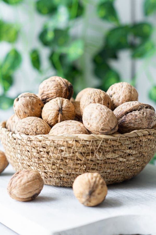 Ripe and Raw Whole Big Walnut Kernel with Shell in Wicker Basket on ...