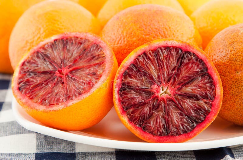 Ripe Red Blood Oranges and Slices in the Plate Stock Image - Image of ...