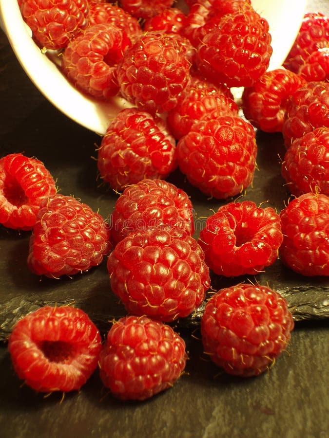 Ripe red raspberries stock image. Image of spills, fruit - 5966903