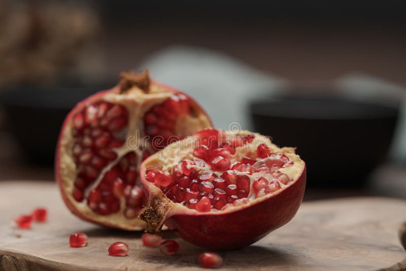 Ripe Small Pomegrenate on Olive Wood Board Stock Photo - Image of ...