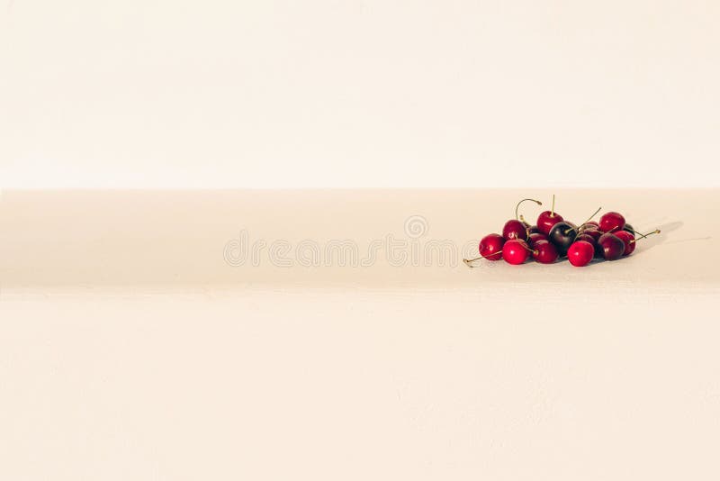 Ripe Sweet Cherry on a White Stone Bench on a Sunny Summer Evening ...