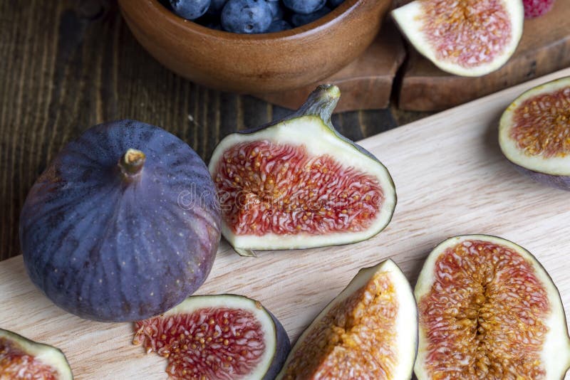 Ripe Sweet Figs Cut into Pieces Stock Photo - Image of natural ...