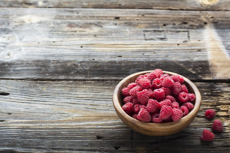Ripe Sweet Raspberries in Bowl on Table Close-up Stock Photo - Image of ...