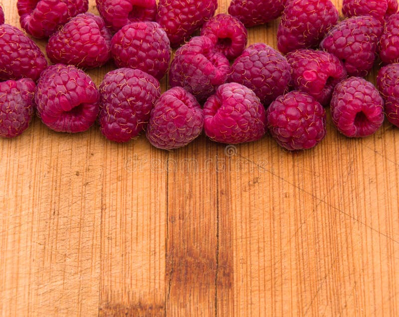 Ripe Sweet Raspberries on Wood Table Close-up Stock Image - Image of ...