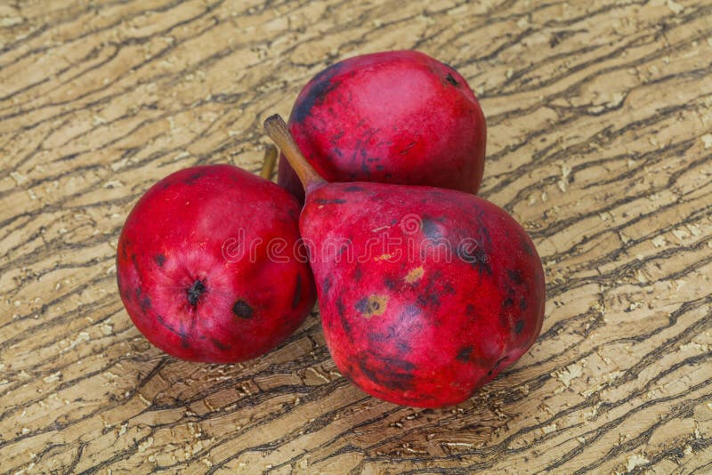 Ripe sweet red pear heap stock photo. Image of cutout - 197085628