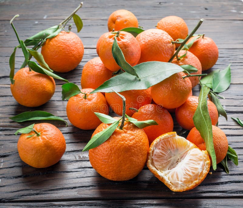 Ripe Tangerines with Leaves on Rustic Table with Cloth Stock Photo ...