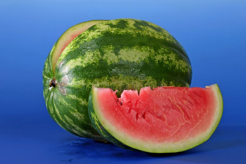 Watermelon on Blue Background Stock Photo - Image of ingredient ...