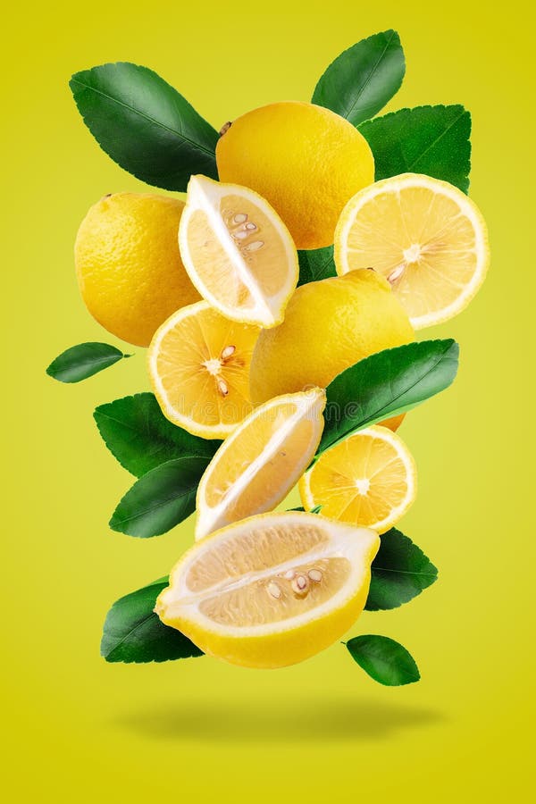 Ripe Yellow Lemon Fruit and Leaves Isolated Over a Yellow Background ...