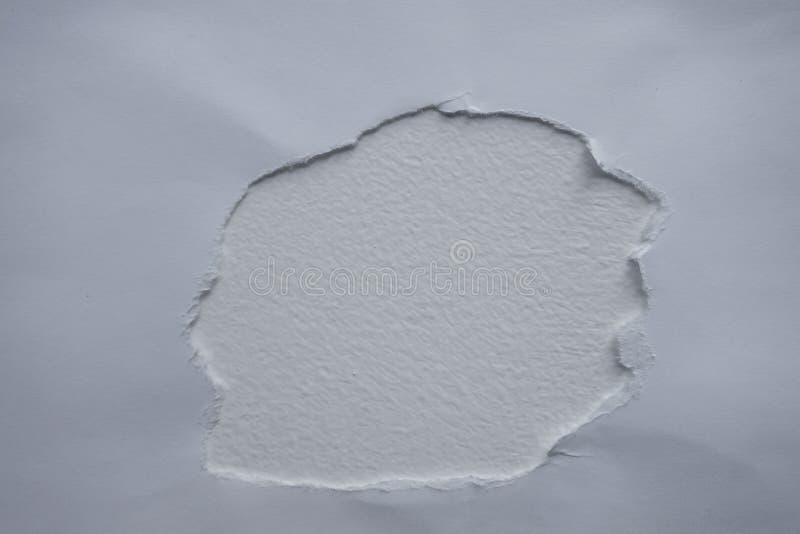 Hole Riped Out of White Paper Center Stock Image - Image of riped ...