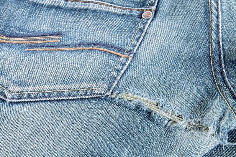Ripped Blue Jeans at the Back Stock Photo - Image of clothing, denim ...