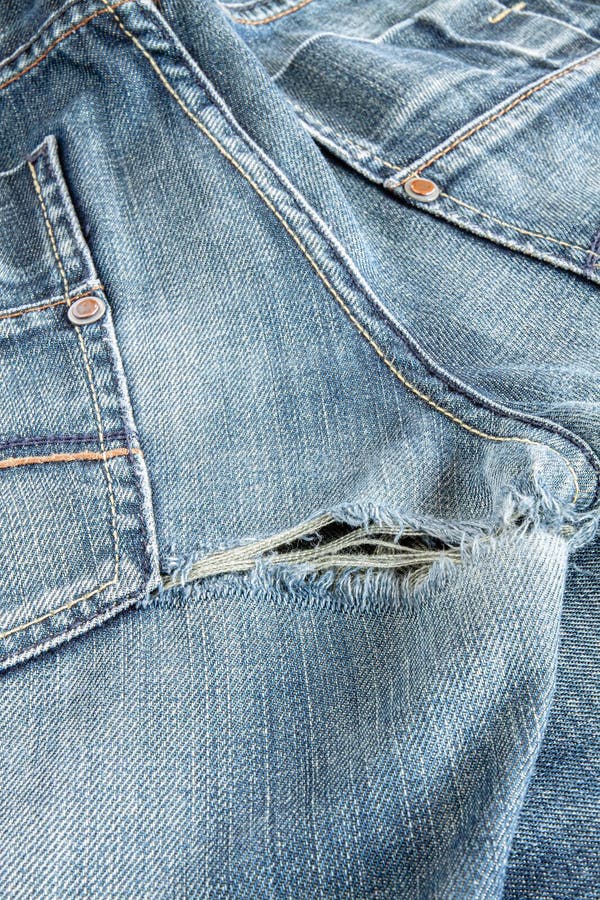 Ripped Blue Jeans at the Back Stock Image - Image of clothing, color ...