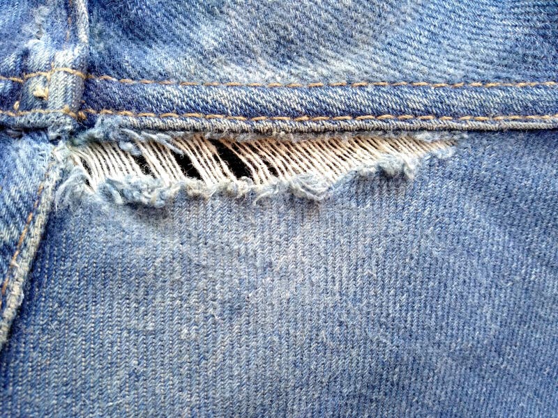 Ripped Destroyed Jeans Background. Jeans Torn Denim Texture Stock Photo ...