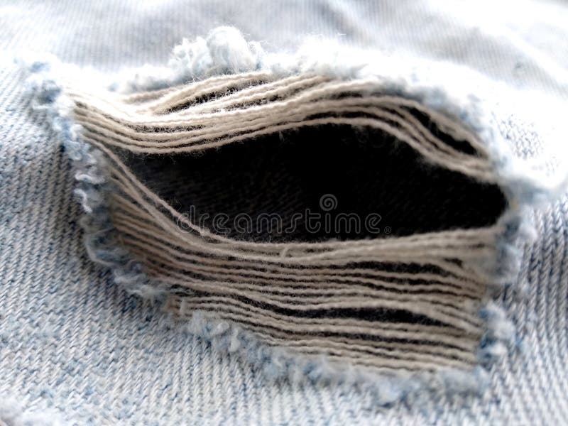 Ripped Destroyed Jeans Background. Jeans Torn Denim Texture Stock Image ...