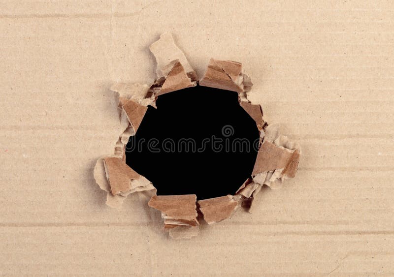 A hole in a package paper stock image. Image of copy - 84227687