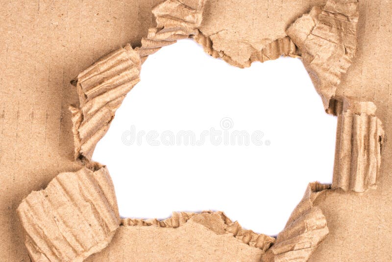 Hole Ripped in Corrugated Cardboard Stock Image - Image of damaged ...
