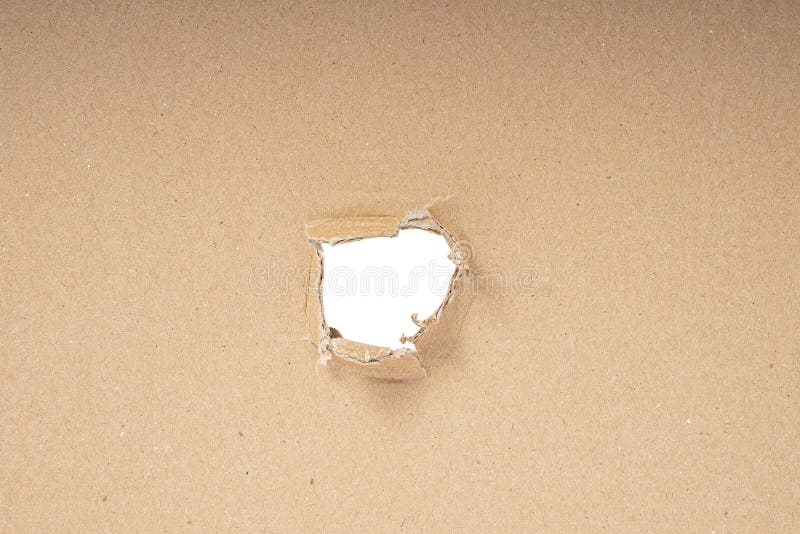 Ripped Hole in Cardboard on White Stock Image - Image of packet, frame ...