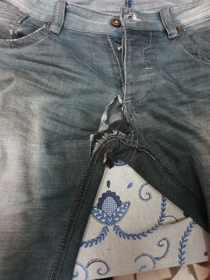 Ripped Jeans stock photo. Image of footwear, fashion - 216029036