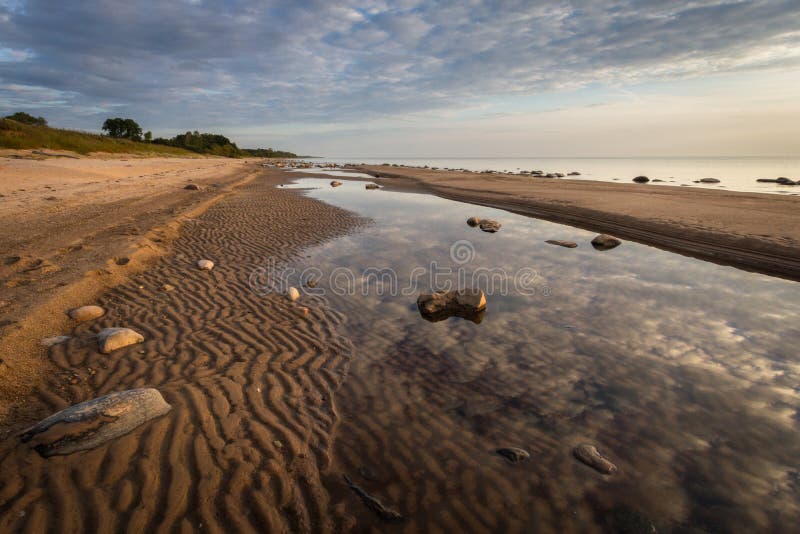 Ripped sand beaches stock photo. Image of clouds, nature - 65403468
