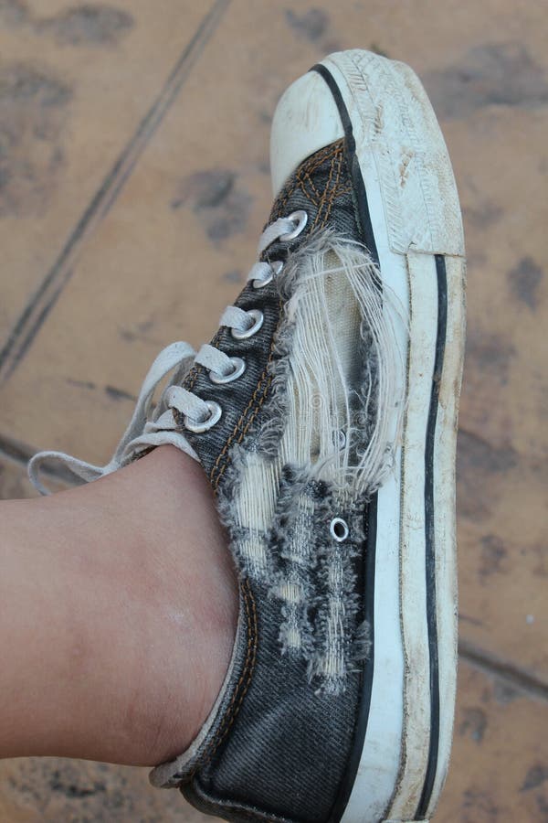 A ripped shoe stock image. Image of challenge, persist - 36277527
