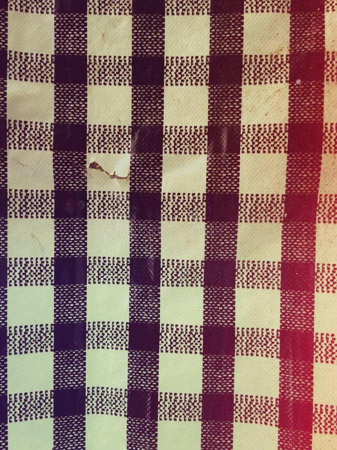 Ripped Table Cloth with Checkered Pattern Stock Photo - Image of feel ...