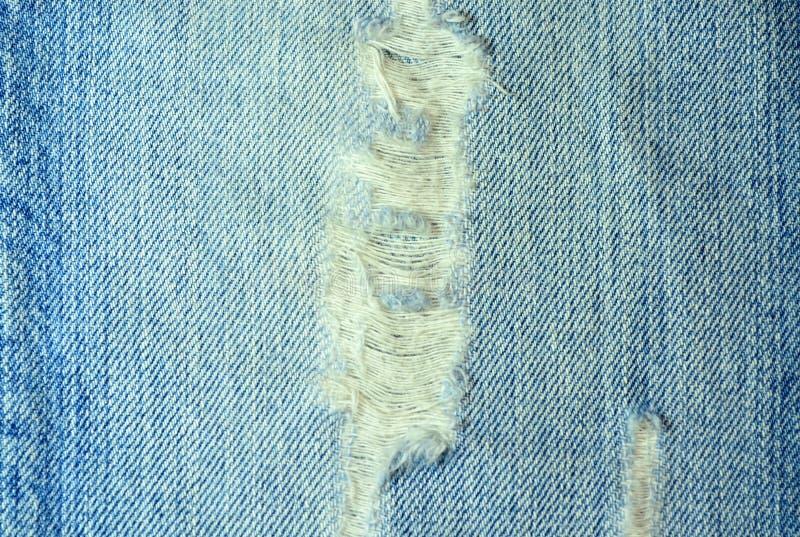Ripped torn jeans stock image. Image of denim, cloth - 62196947