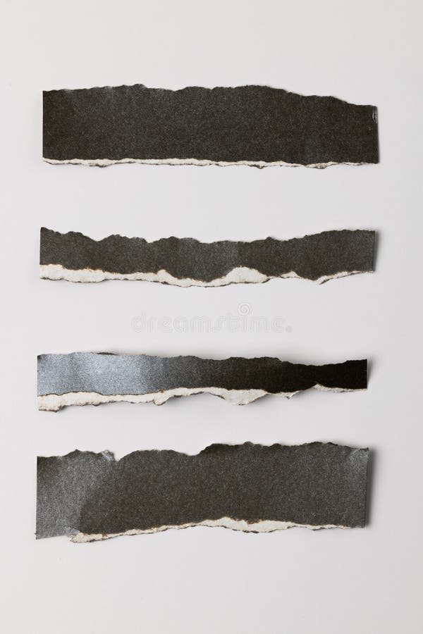 Ripped Up Pieces of Black Paper with Copy Space on White Background ...