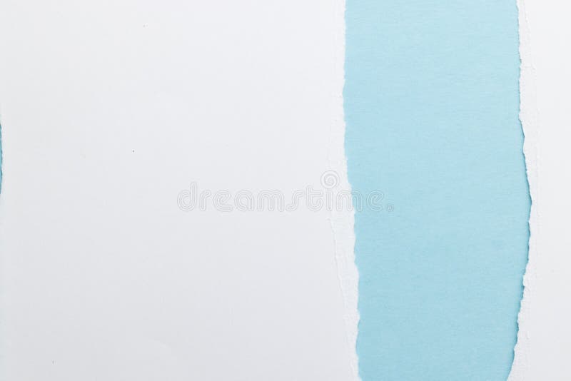 Ripped Up Pieces of White Paper with Copy Space on Blue Background ...