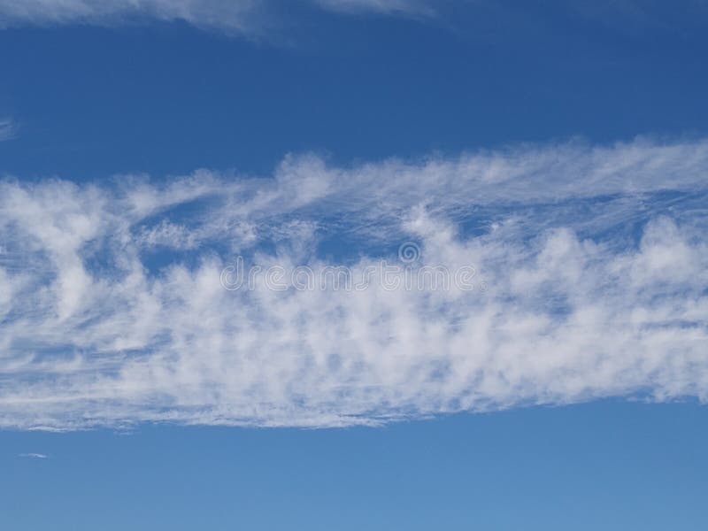 Ripple Ribbon Clouds in Bright Blue Sky Stock Photo - Image of sunlight ...