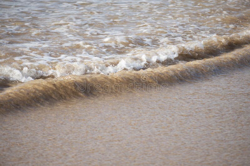 A Ripple Seen from Above on the Edge of the Beach Stock Image - Image ...