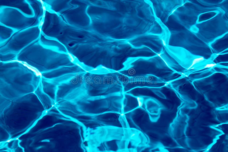 Ripple Water in Swimming Pool with Sun Reflection. Blue Water ...