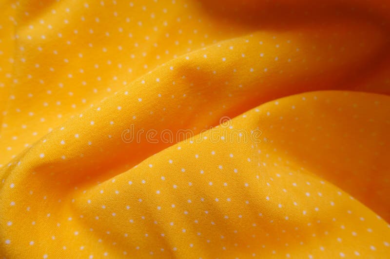 Rippled Amber Yellow Fabric with White Pin Dot Pattern Stock Image ...