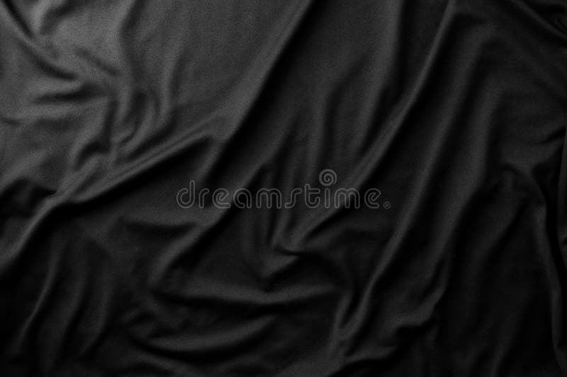 Rippled Black Fabric Texture Background. Cloth is Wrinkled Stock Photo ...