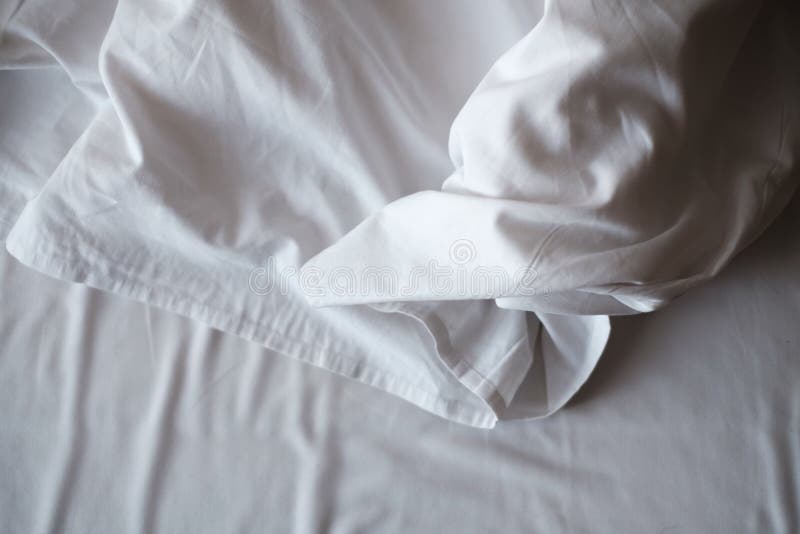 Rippled Cotton Fabric Bedding after Sleeping. Top View Stock Image ...