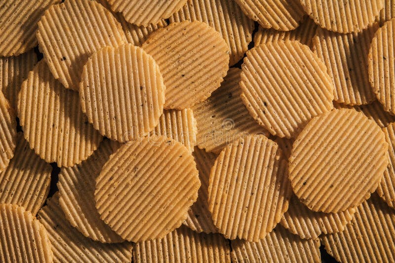 Rippled potato chips stock image. Image of tasty, potato - 87687497