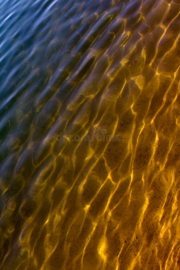 Rippled Water Pond stock photo. Image of undulating, golden - 452788