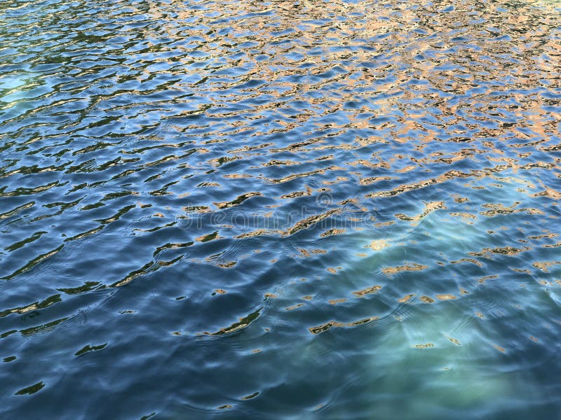 Rippled Water Surface with Rich Blue Color and Contrasting Color ...