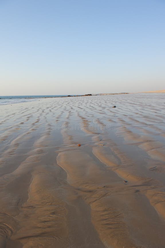 Rippled Wet Beach at Low Tide Stock Image - Image of coast, blue: 21145193