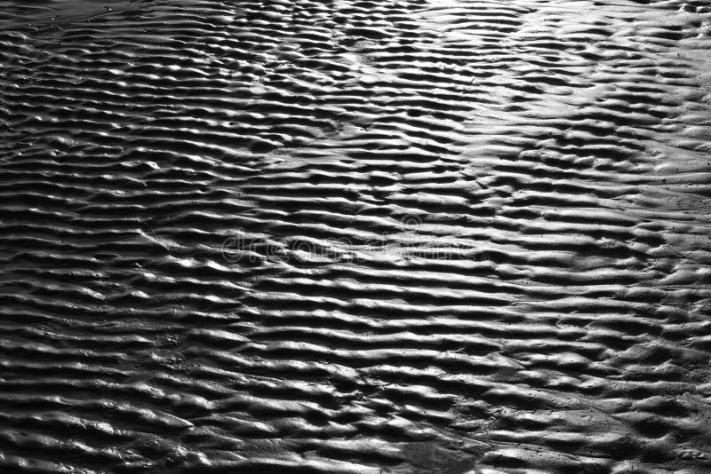 Rippled wet sand patterns stock image. Image of outside - 3832185