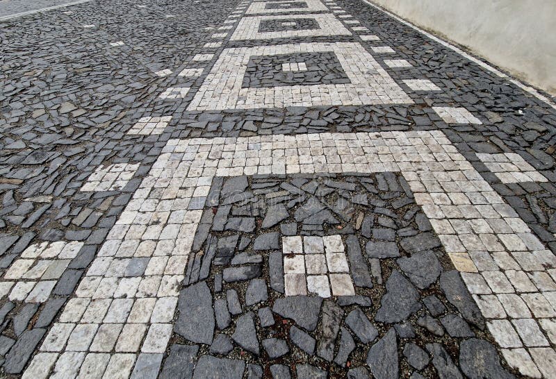 Ripples Pattern from Mosaic Cubes on Black Rough Pavement. Squares and ...