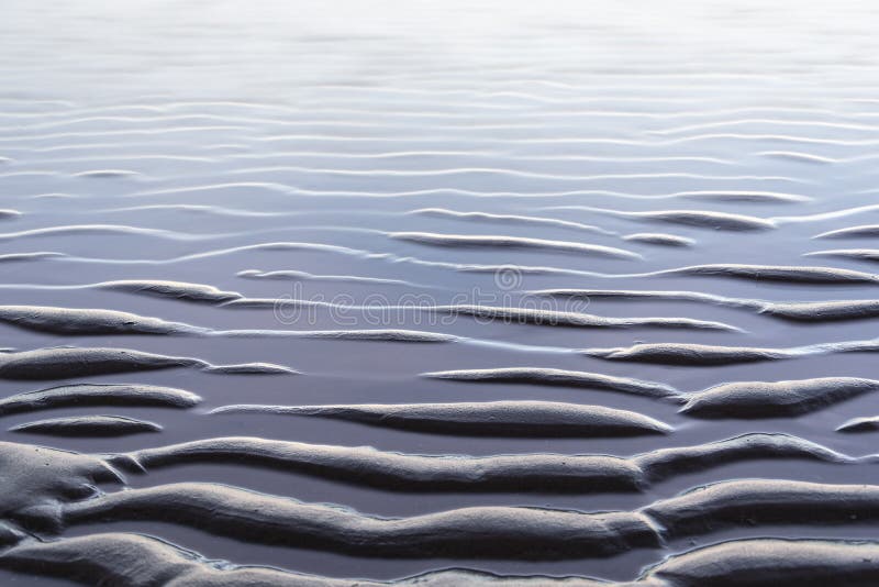 Ripples in the sand stock photo. Image of coastline - 119985450