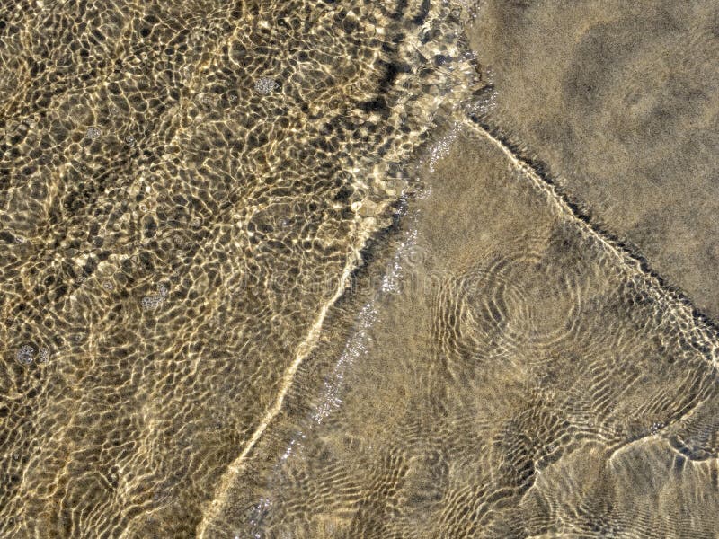 Ripples on the Surface of the Water on the Beach Stock Image - Image of ...
