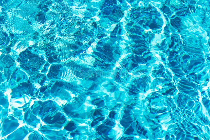 Ripples on the Surface of the Water in a Blue Swimming Pool Stock Photo ...
